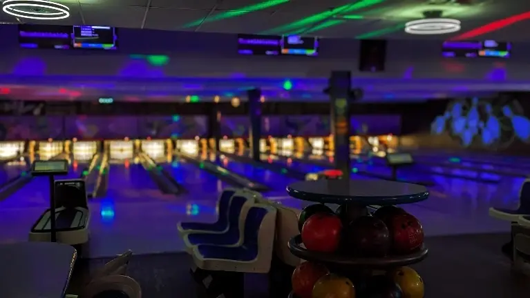 Bowling bar game-room kitchen party room’s pool table darts boards in ...